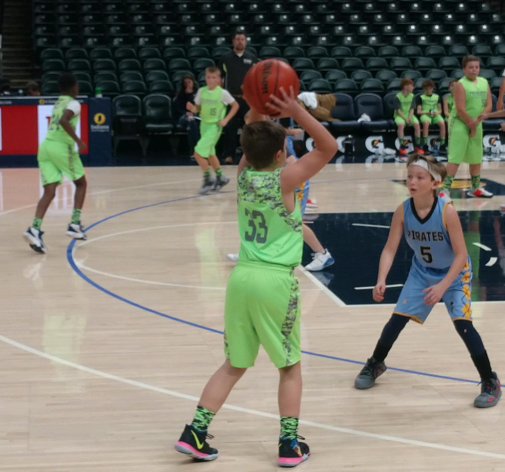 Local travel basketball team competes in NBA arena – Coles County Sports